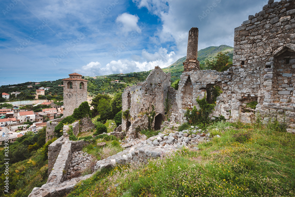Ancient stone ruins and clock tower at Old Bar town, Montenegro. Stari ...