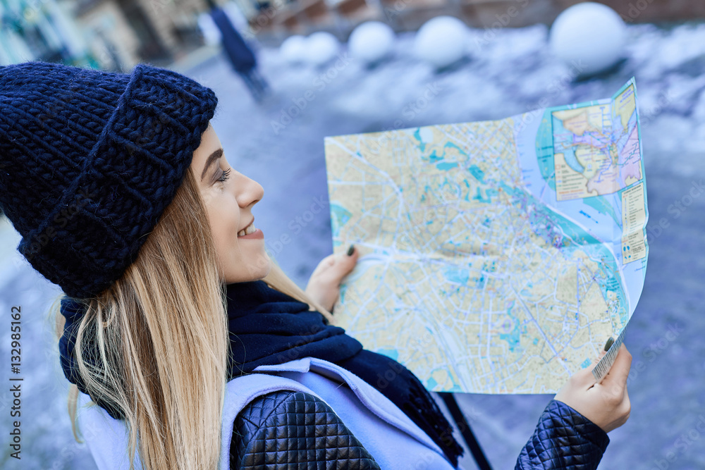 Beautiful girl looking at the map right way in a foreign city Stock ...