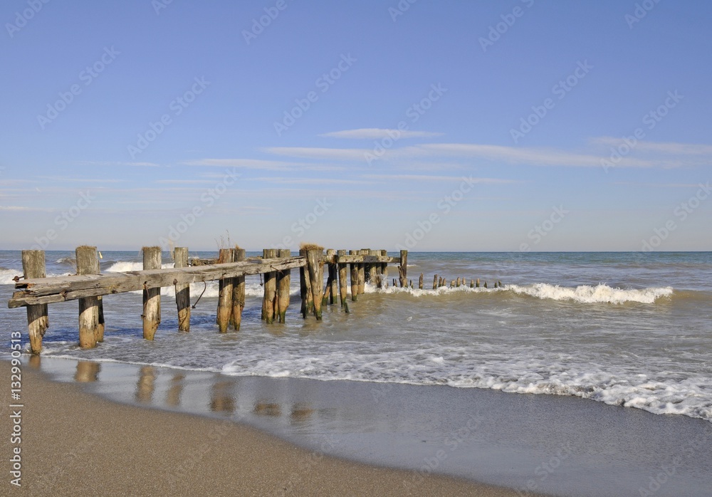 shoreline with an deteriorating pier at Fifty Point Conservation Area ...