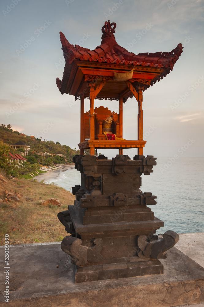 Bali Hindu Shrines During Sunrise. A majestic and dramatic sunrise ...