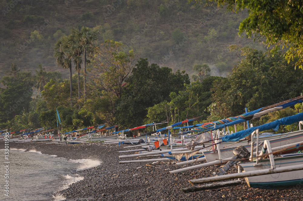 Bali Traditional Fishing Boats. Fishing boats, called jukung, are lined ...