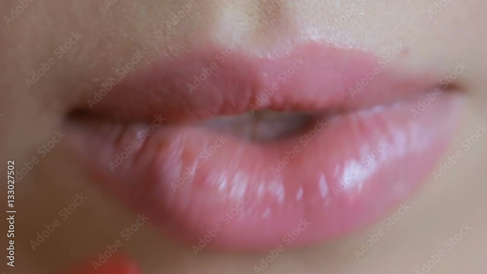 girl touching sores on the lips. herpes. lip treatment, Young plump ...