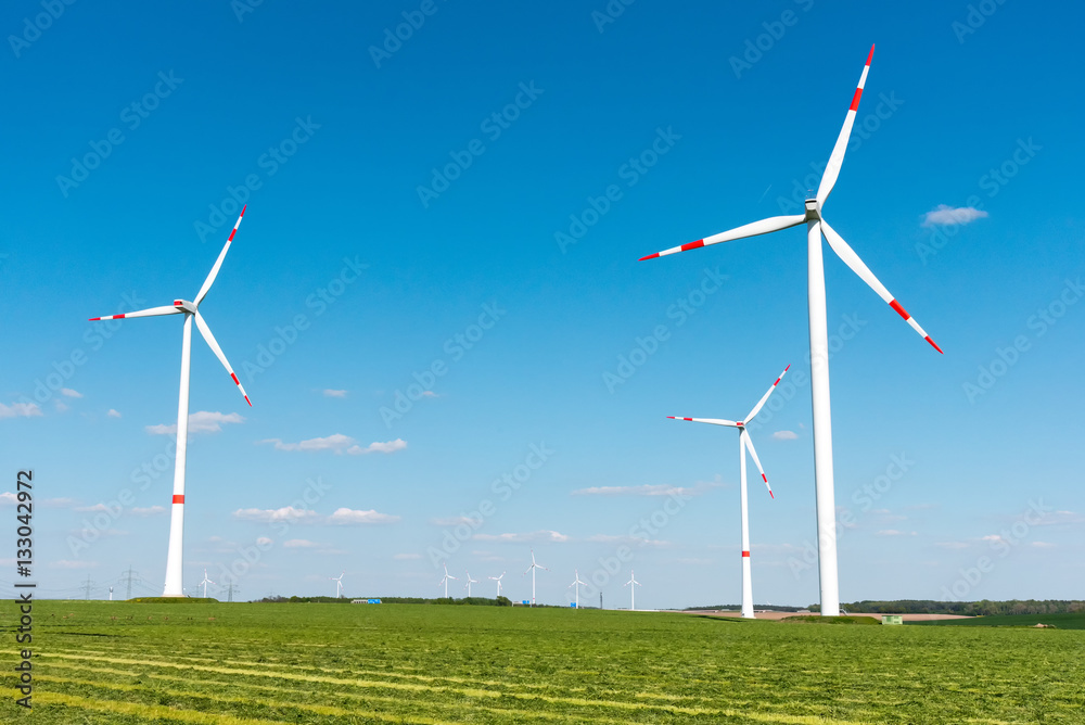 Wind engines in the fields seen in Germany Stock Photo | Adobe Stock