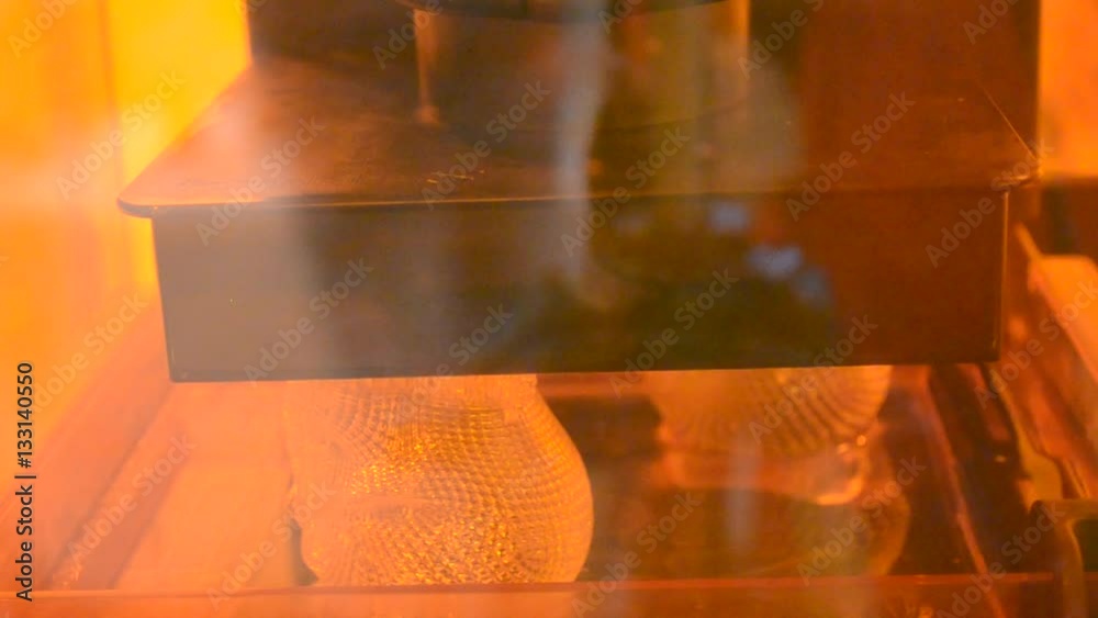 3d printer printing photopolymer. Print using special resins that ...