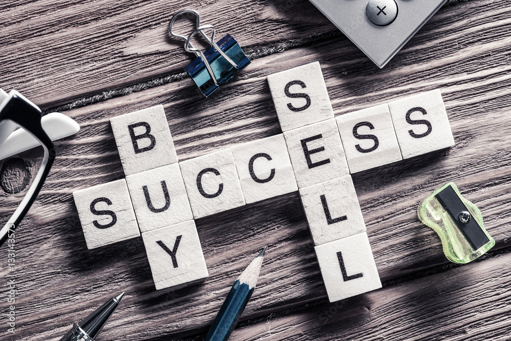 Conceptual business keywords on table with elements of game making ...