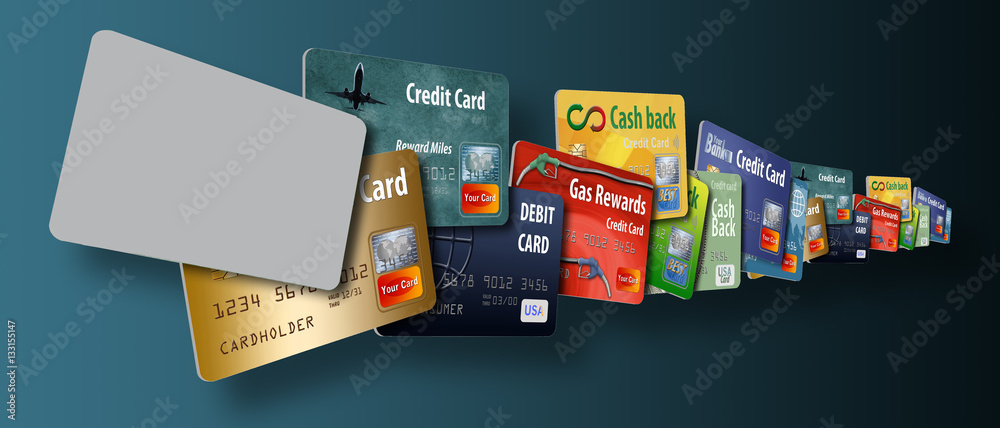 Credit cards and debit cards stacked together to represent having too ...