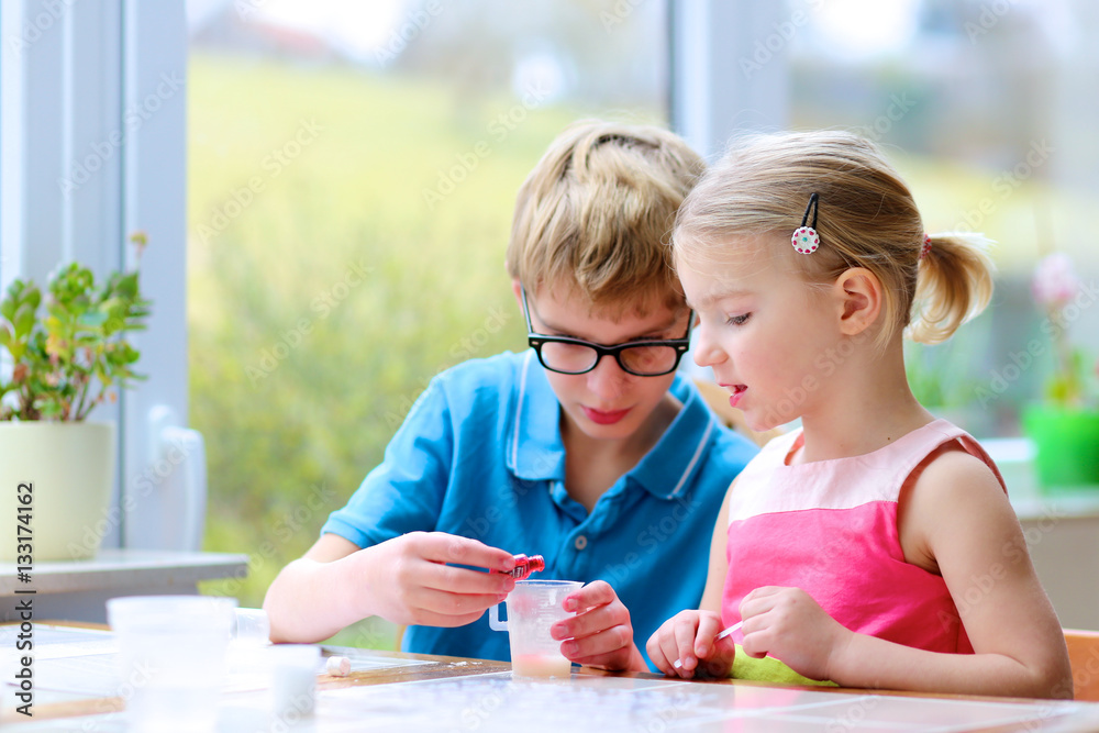Children making delicious and brightly coloured candies using candy ...