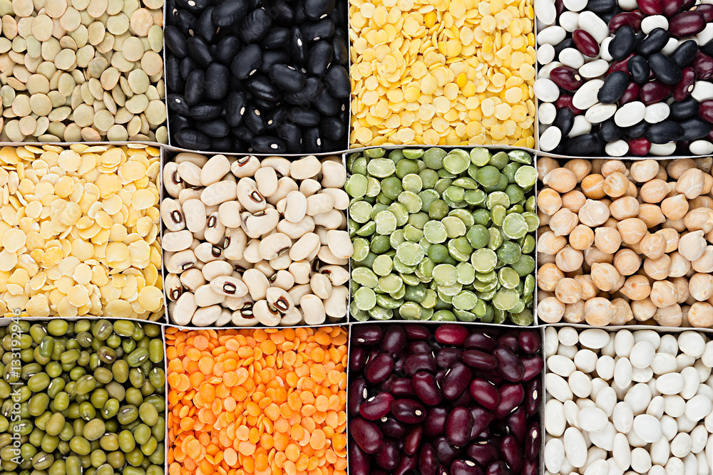 Pulses food background, assortment - legume, kidney beans, peas ...