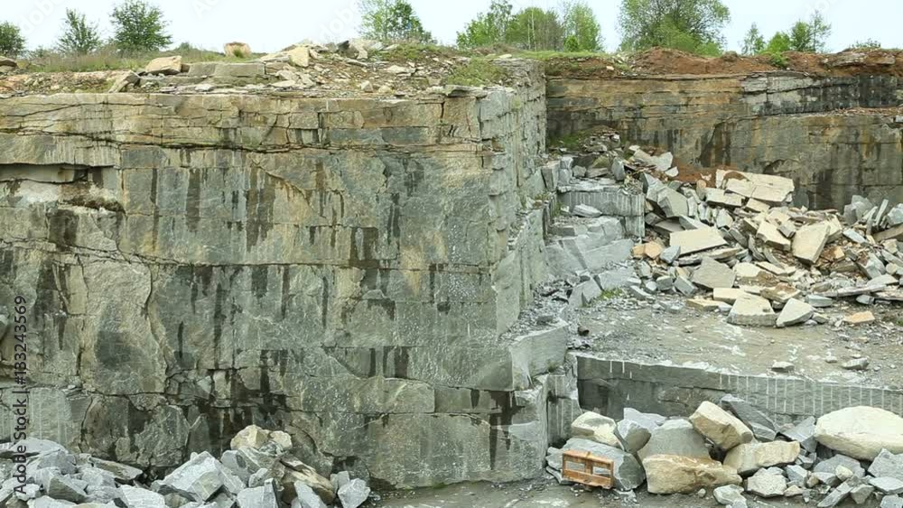 Quarry mining granite open-cast. Vertical pan Stock Video | Adobe Stock