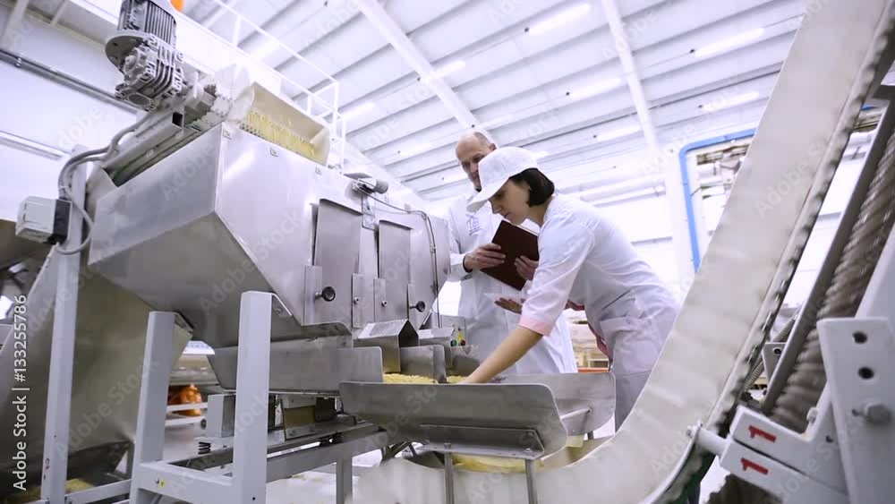 Checking the product quality on the macaroni factory Stock Video ...