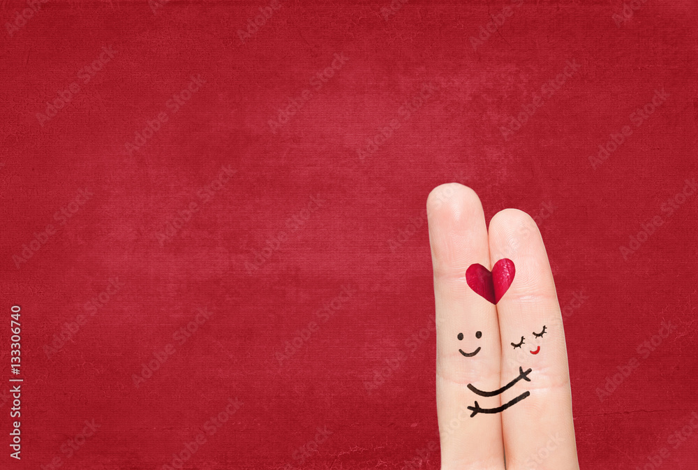 Couple in love with your finger on a solid background. Stock Photo ...
