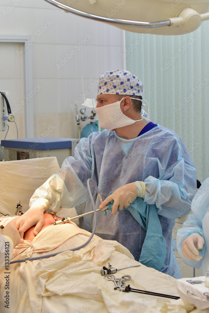 Nurse/Photo of active operations... the Surgeon with an endoscope ...