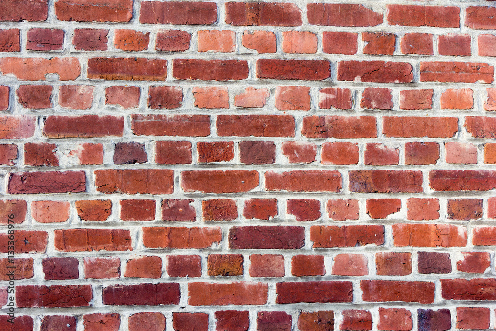 Red bricks in layers as a cladding of a wall Stock Photo | Adobe Stock