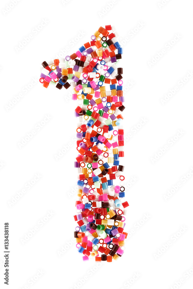 Figure one "1" composed using plastic particles of different colors ...