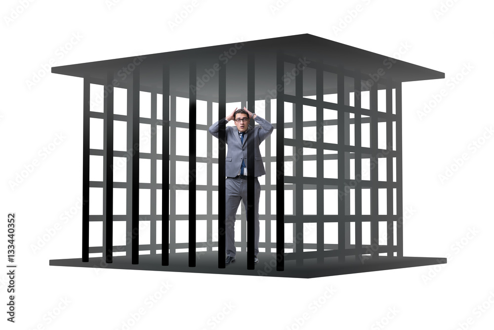 Foto Stock Businessman in the cage isolated on white | Adobe Stock