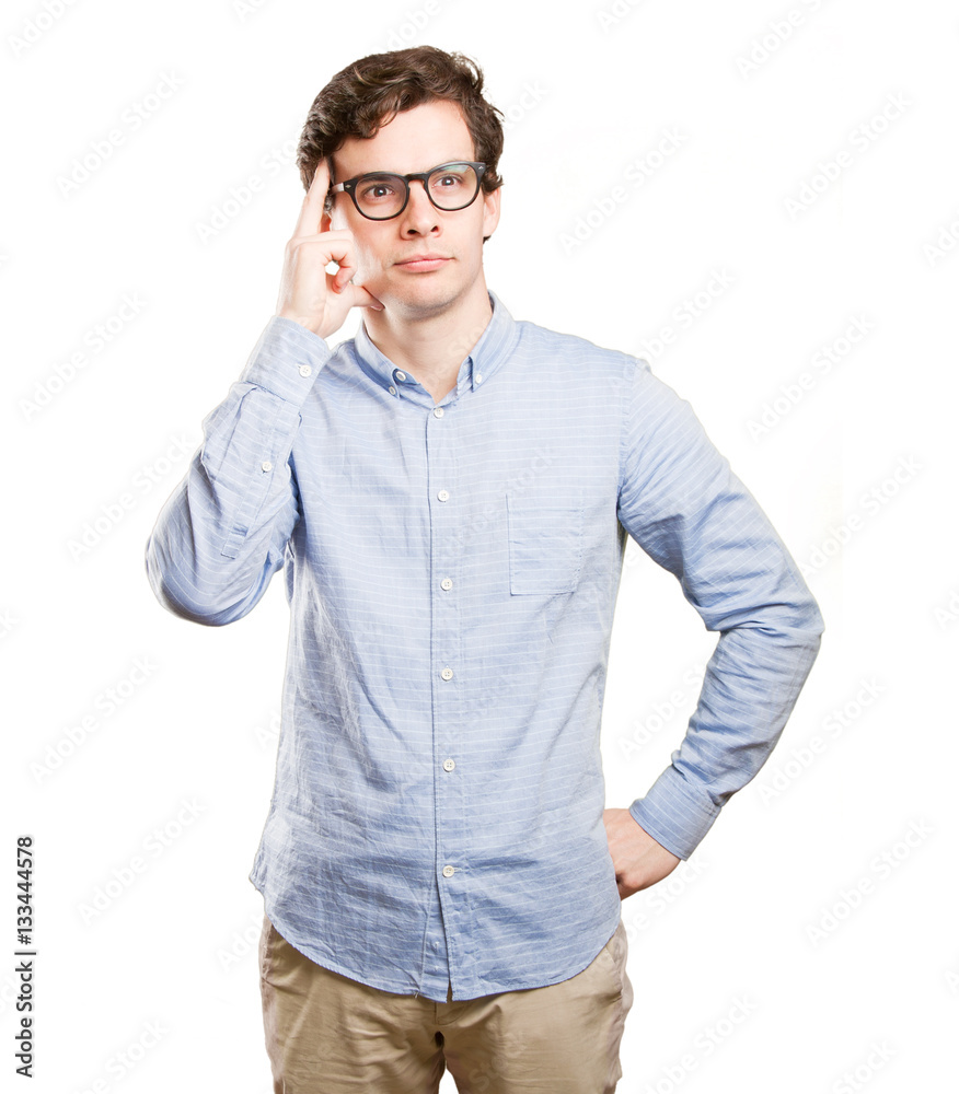 Concentrated young man wondering Photos | Adobe Stock