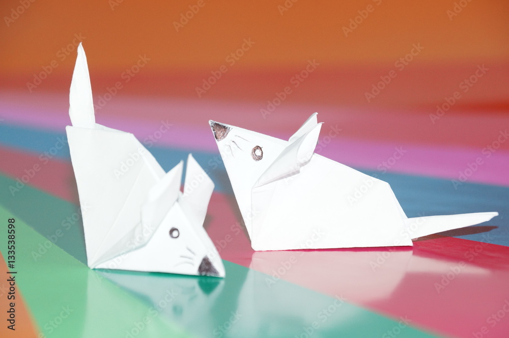 Paper origami mouse isolated on the colorful background Stock Photo ...