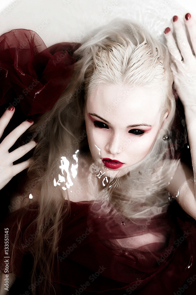 Halloween scene of an immortal female vampire in a bloody in a s Stock ...