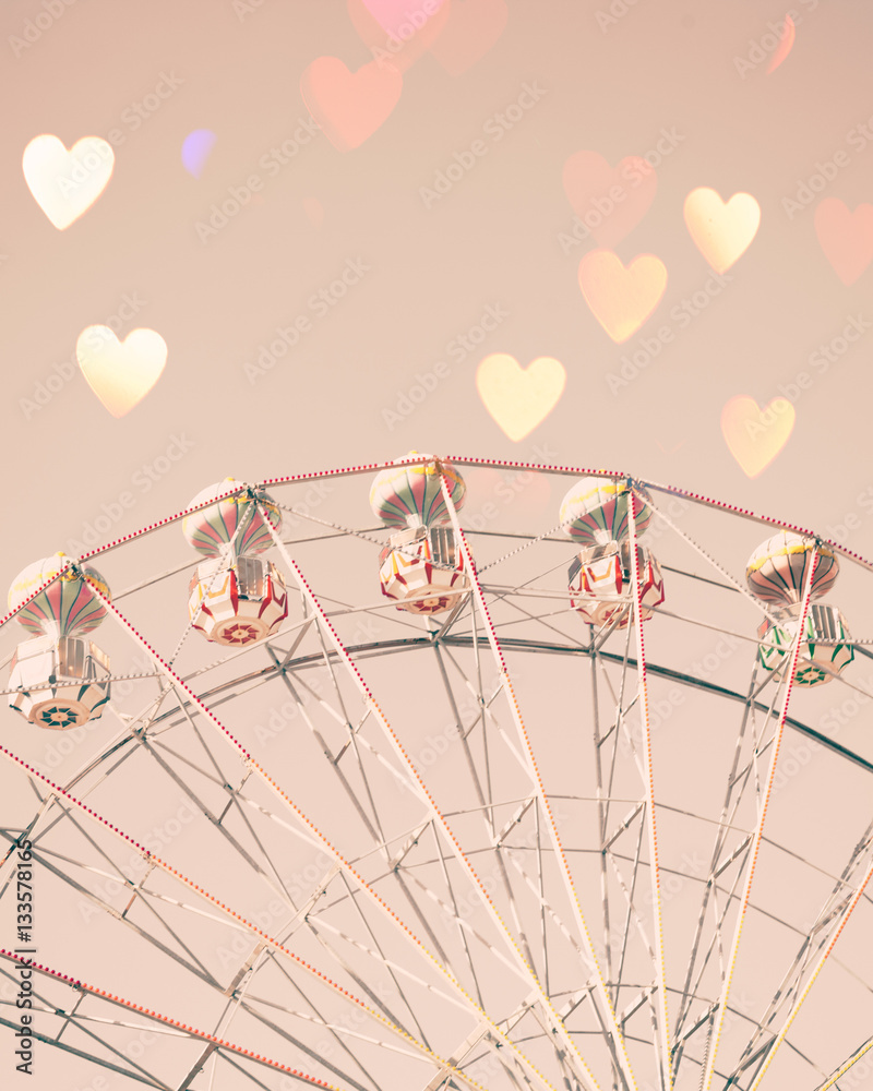 Vintage ferris wheel with heart shaped overlay Stock Photo | Adobe Stock