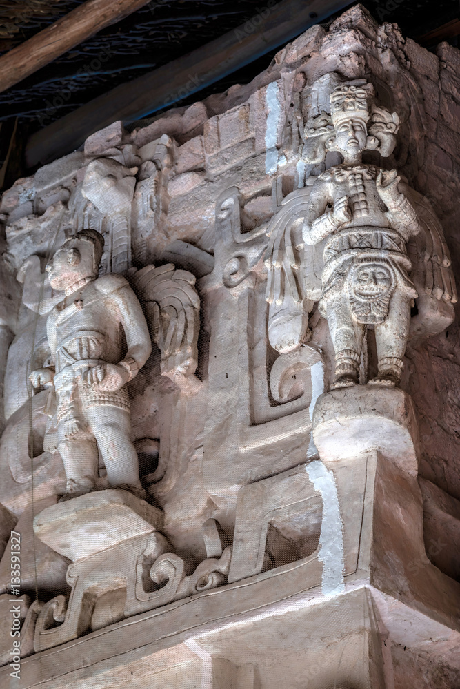 Winged Maya Warriors on the facade of the tomb of U Kait Kan Leak Tok ...