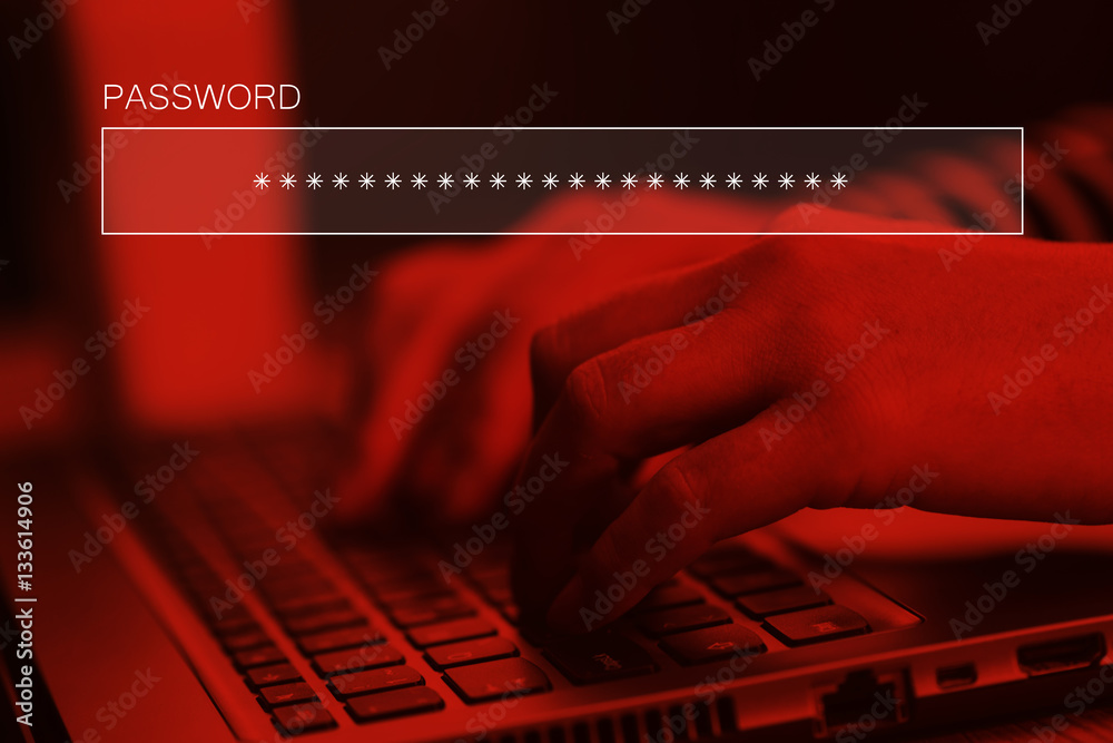 Typing online account password on laptop computer keyboard Stock Photo ...