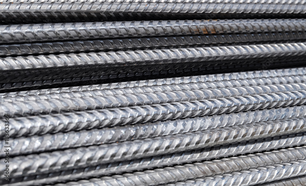 Division rebar from a construction site - a closeup of a stack of metal ...