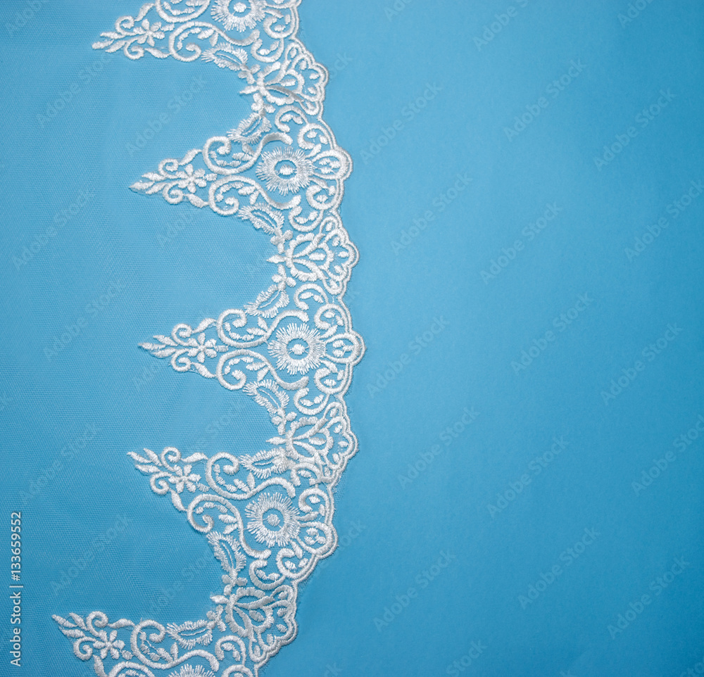 Invitation, greeting or wedding card with white lace on blue background ...