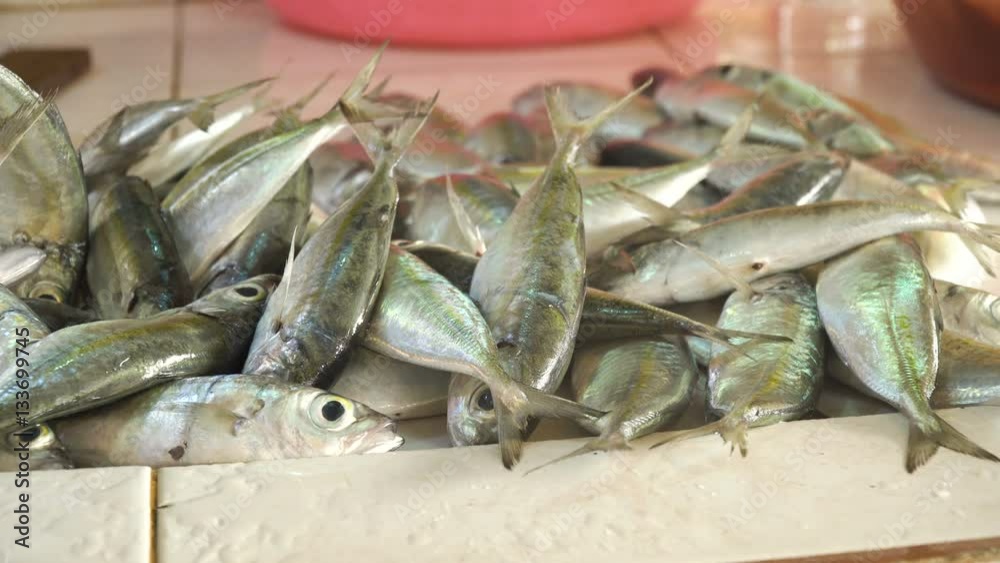 Fresh fish in Asian market. Sale of fresh sea fish in the Asian public ...