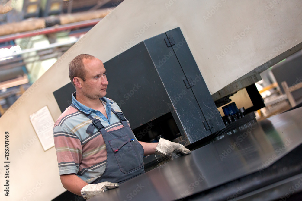 Factory Man Worker Operating Coordinate Punching Machine at Workshop ...
