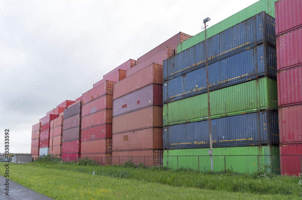 piled up containers Stock Photo | Adobe Stock