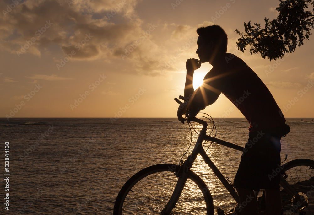 Man thinking watching the sunset. Stock Photo | Adobe Stock