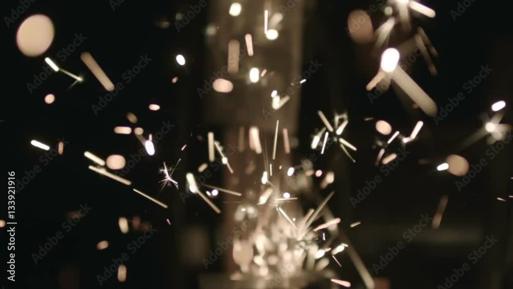 Sparks flashing and popping in close shot of grinder Stock Video ...