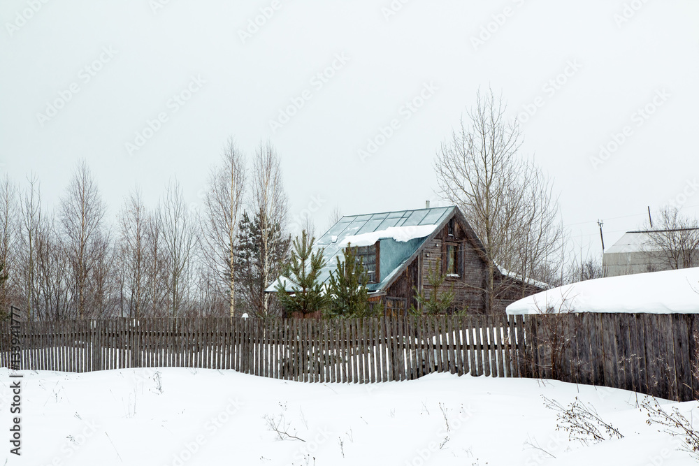 Village in a winter and snowfall Stock Photo | Adobe Stock