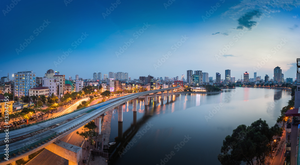 Aerial view of Hanoi cityscape by twilight period, with Dong Da lake ...