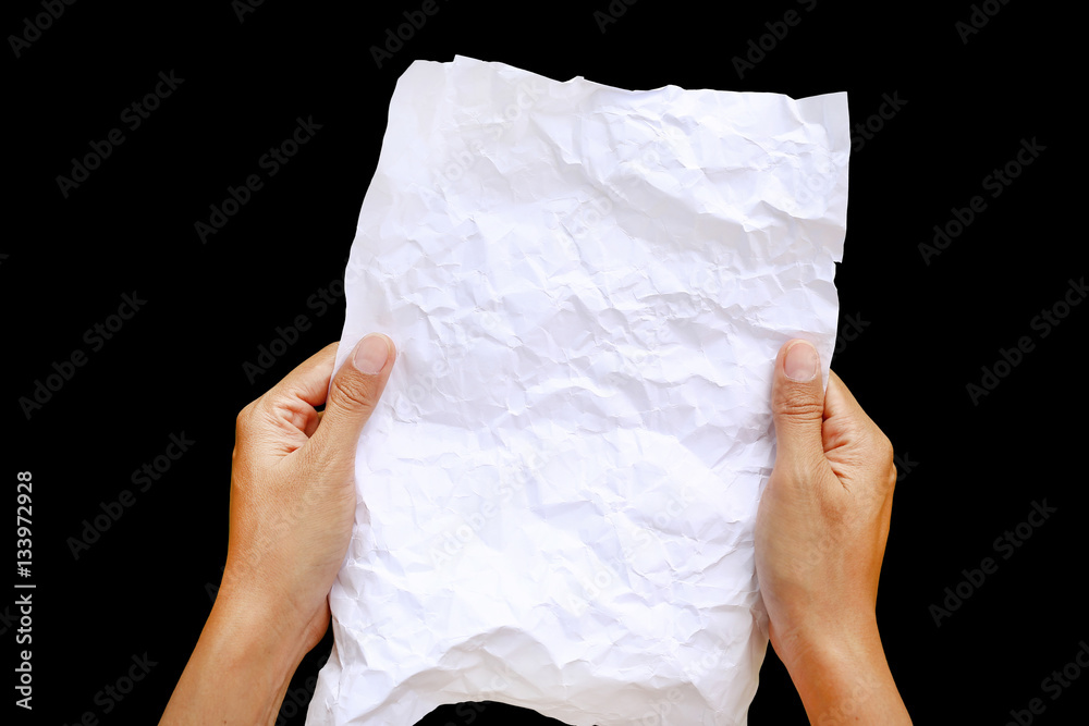 Woman hands holding vertical square crumpled paper on black background ...