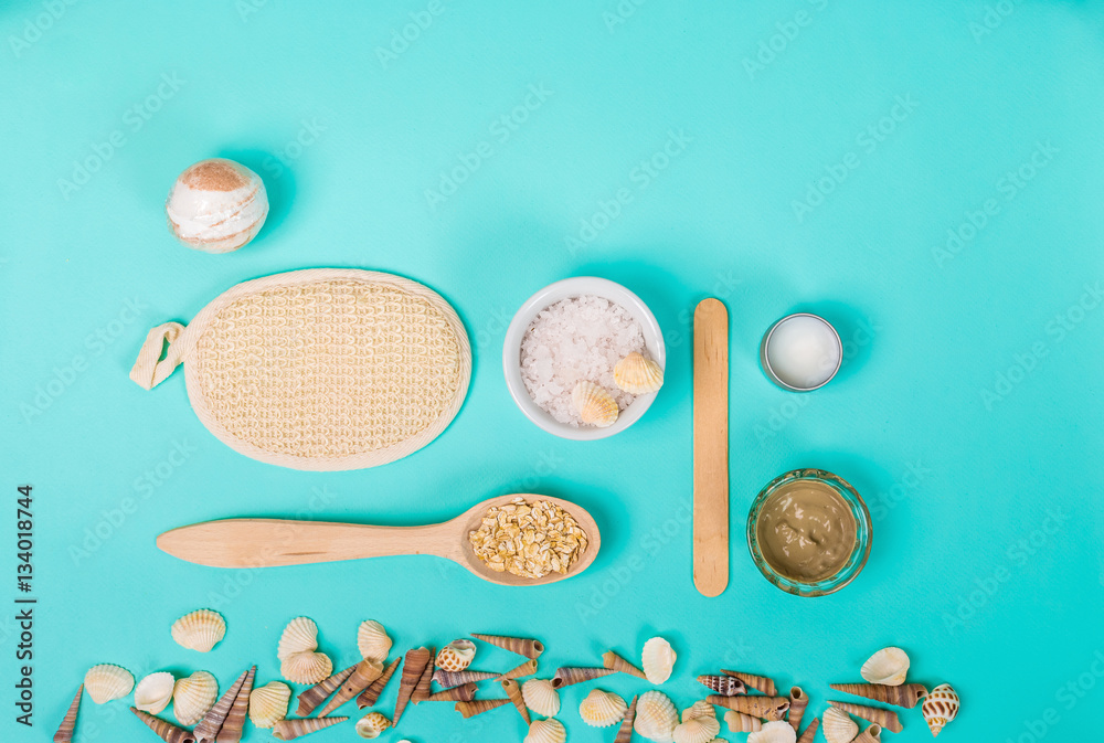 Spa sea salt, shells on blue background. Stock Photo | Adobe Stock