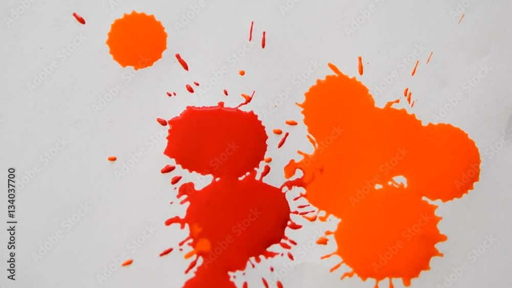 Drip drops of different red, Orange colors and mixed on a white ...