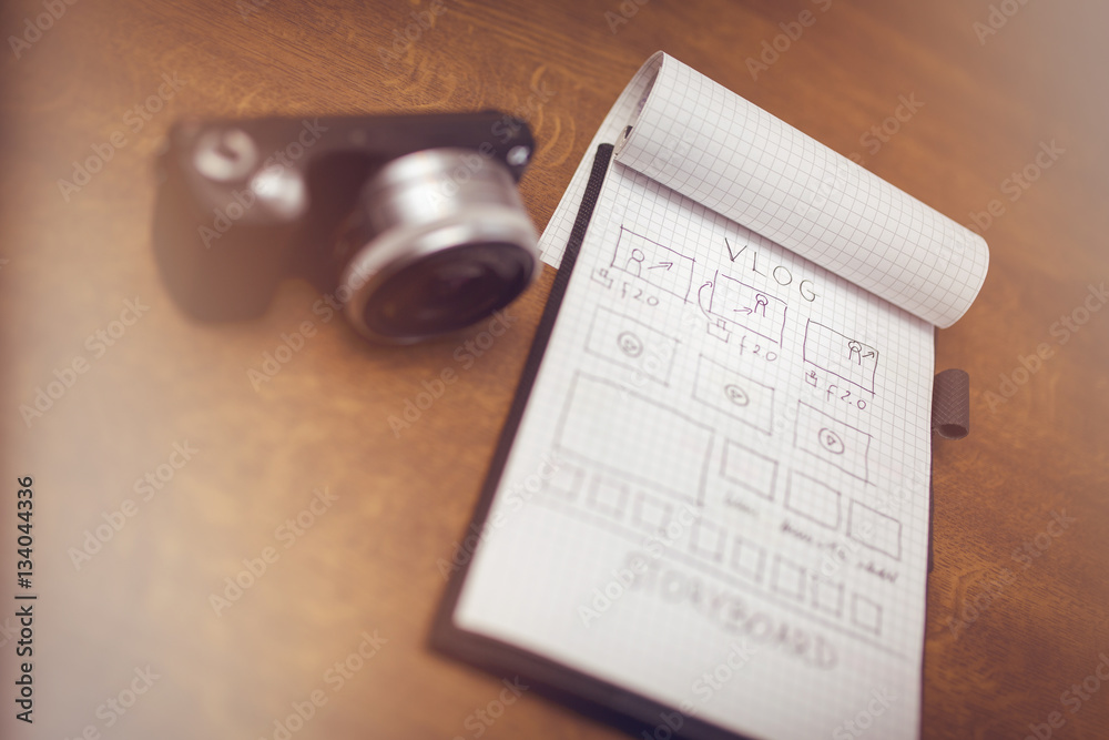 Notepad with storyboard and digital camera Stock Photo | Adobe Stock