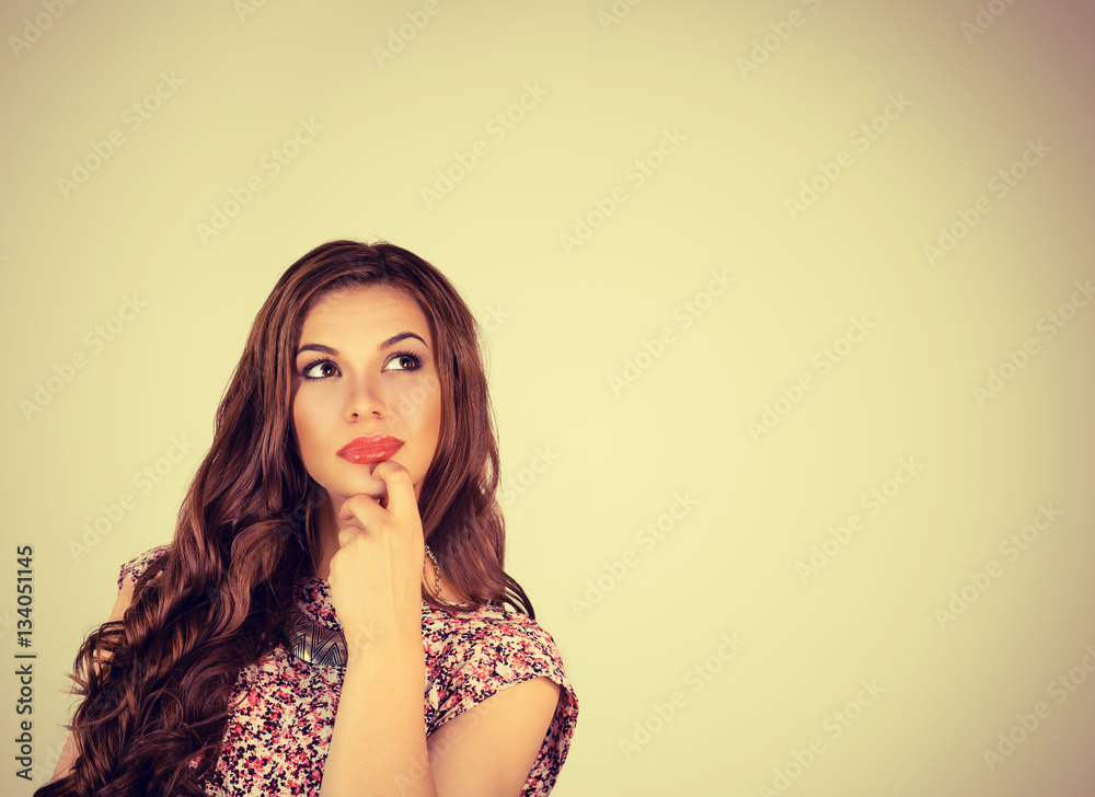 Confused woman thinking Stock Photo | Adobe Stock