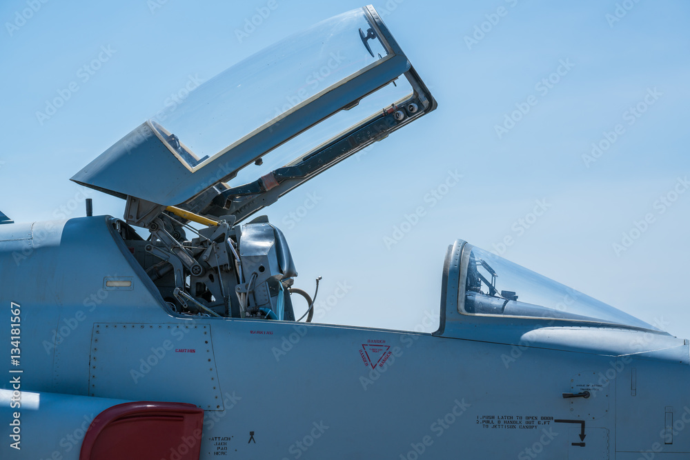 F-5E falcon cockpit under opened canopy at air show. Cockpit Of Fighter ...