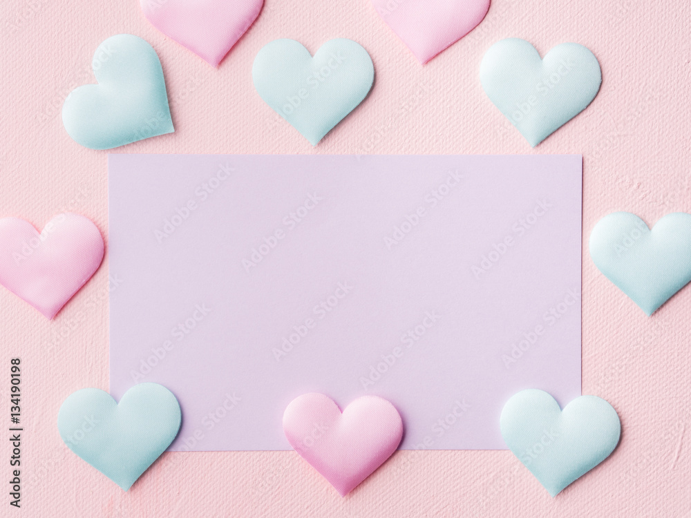 Pastel color card on pink textured background. Baby birthday party ...