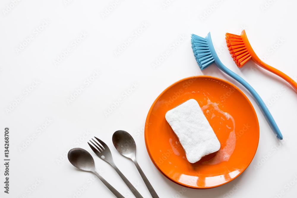Foto Stock concept of washing dishes on white background top view ...