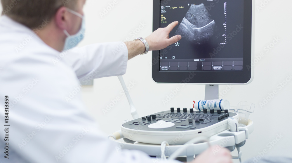 Ultrasound machine doctor"s hand usg investigation USCG Stock Photo ...