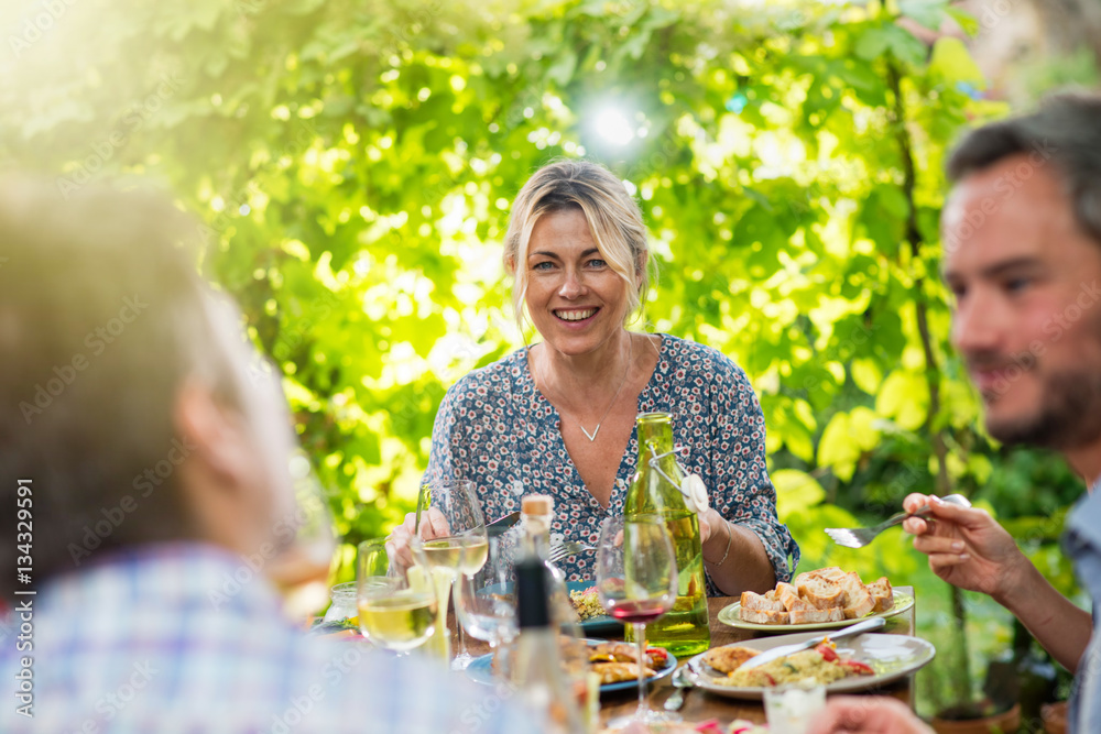 Group of friends having fun around a table on a terrace Stock-Foto ...
