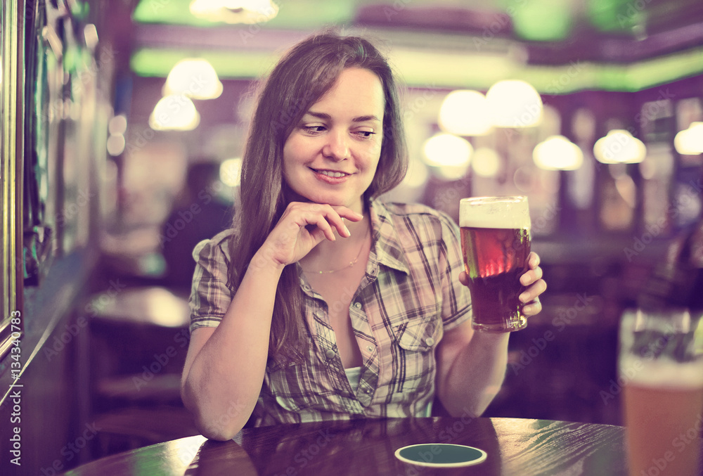 Exotic Brunette Drinking Beer
