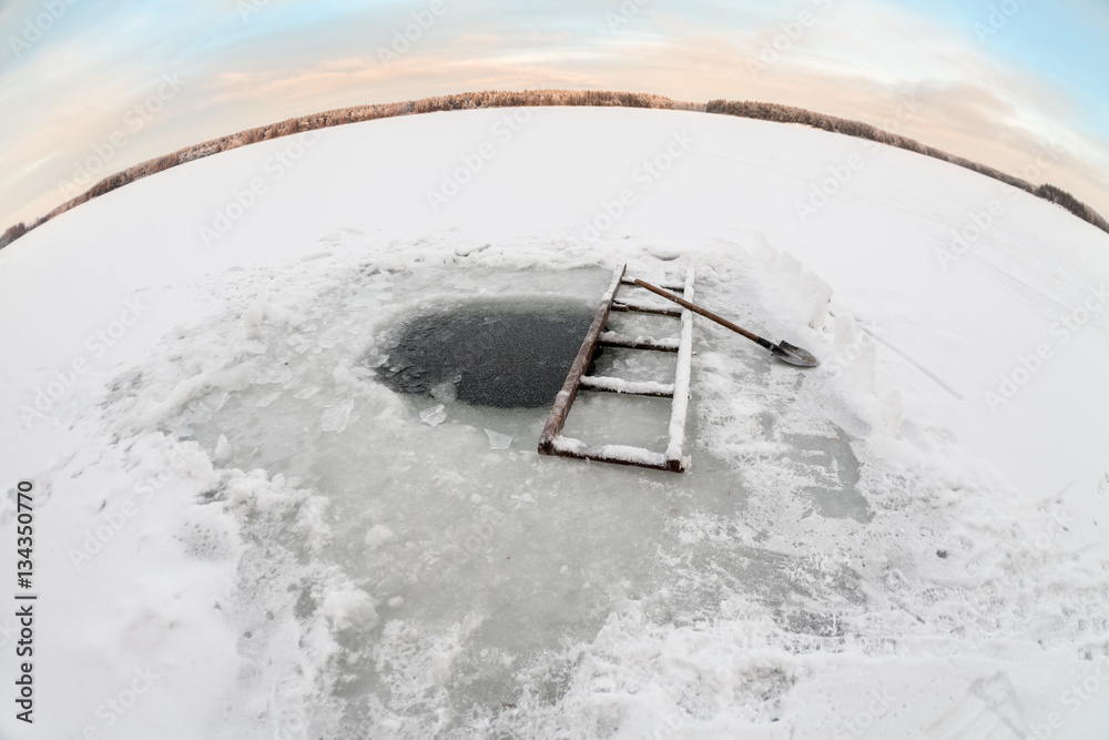 Ice-hole for winter swimming in lake ice, nobody. Wide angle view Stock ...
