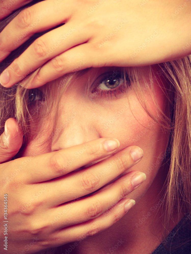 Ashamed embarrassed blonde woman with hands on face Stock Photo | Adobe ...