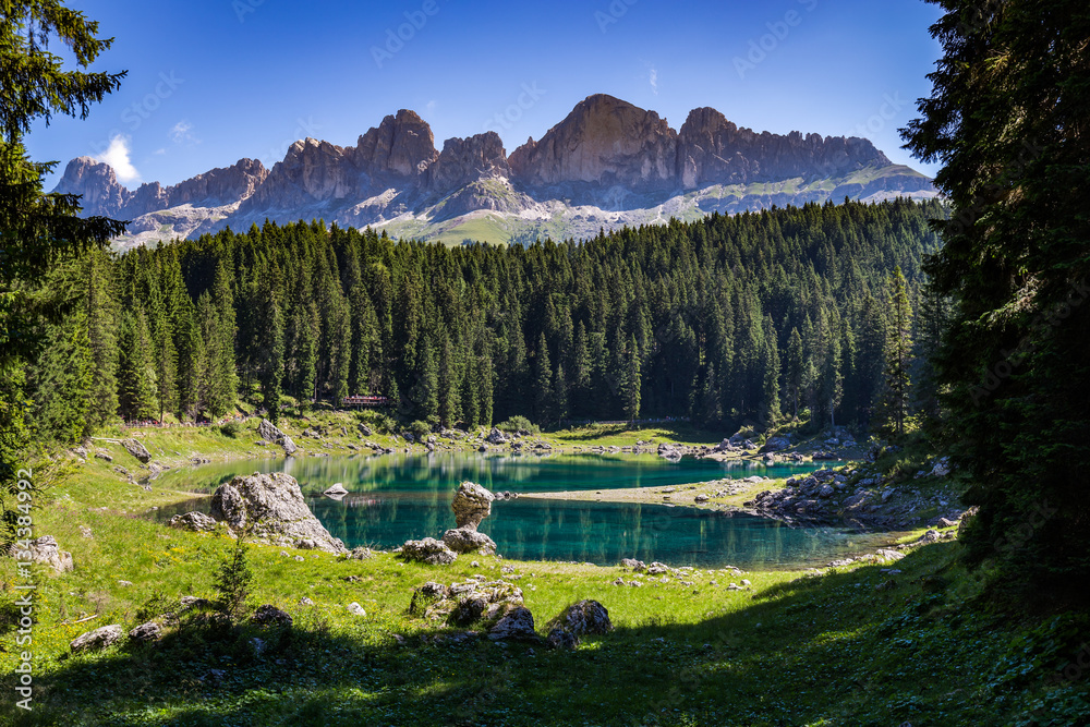 View of Karersee (Lago di Carezza), one of the most beautiful alpine ...