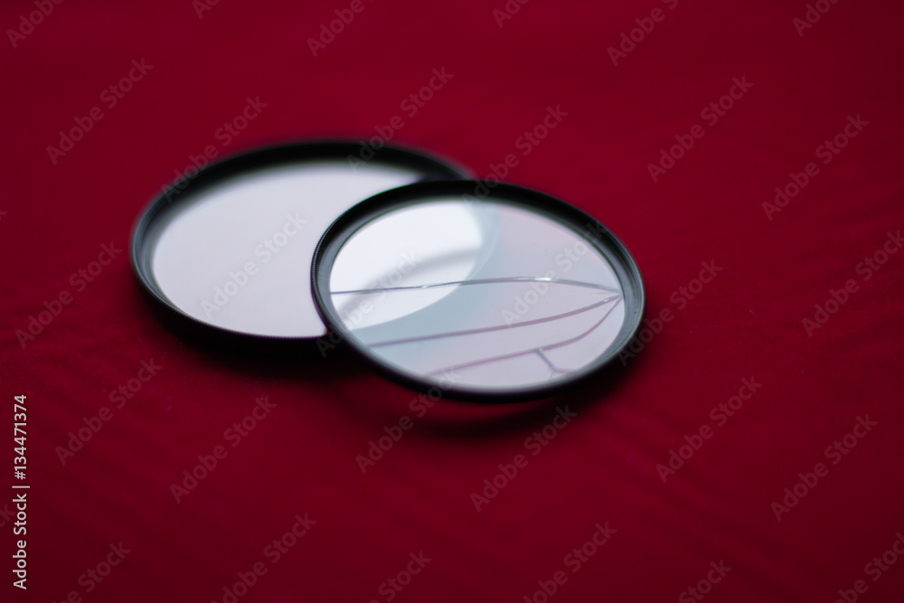 lens filter with a broken glass. camera lens Stock Photo | Adobe Stock