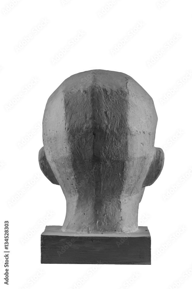 plaster statue of a human skull and head with an angular outline ...